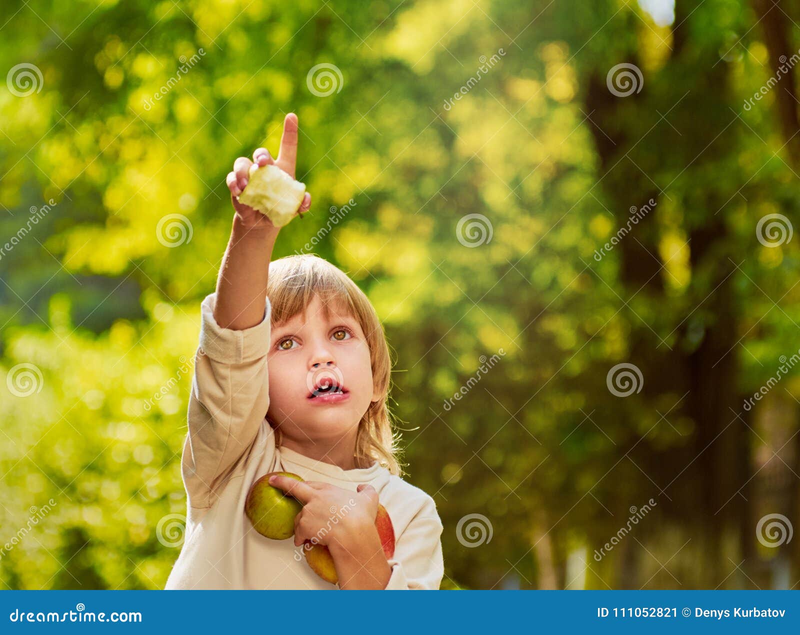 Boy with apples gesturing stock image. Image of health - 111052821