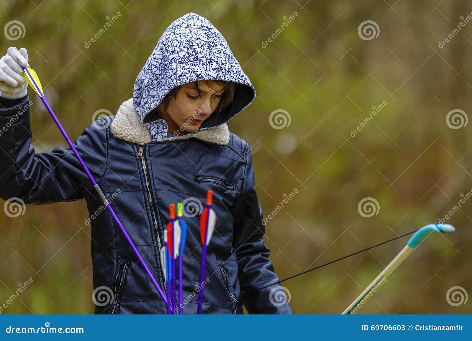 Boy Archer Shooting with His Bow at an Outdoor Stock Image - Image of ...