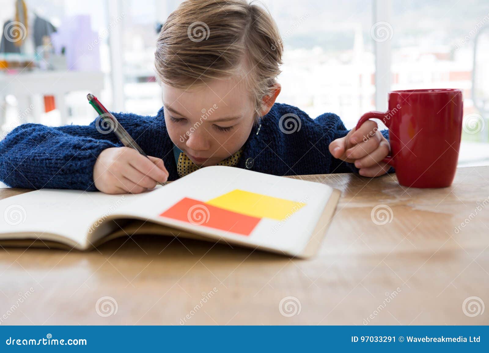 Boy As Business Executive Writing in a Book Stock Image - Image of ...
