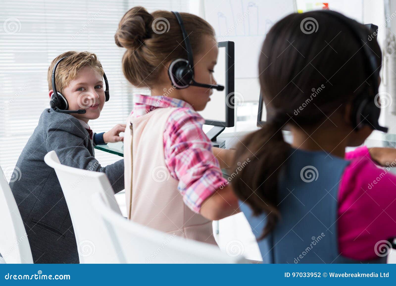Boy As Customer Care Executive Smiling while Working in the Office ...