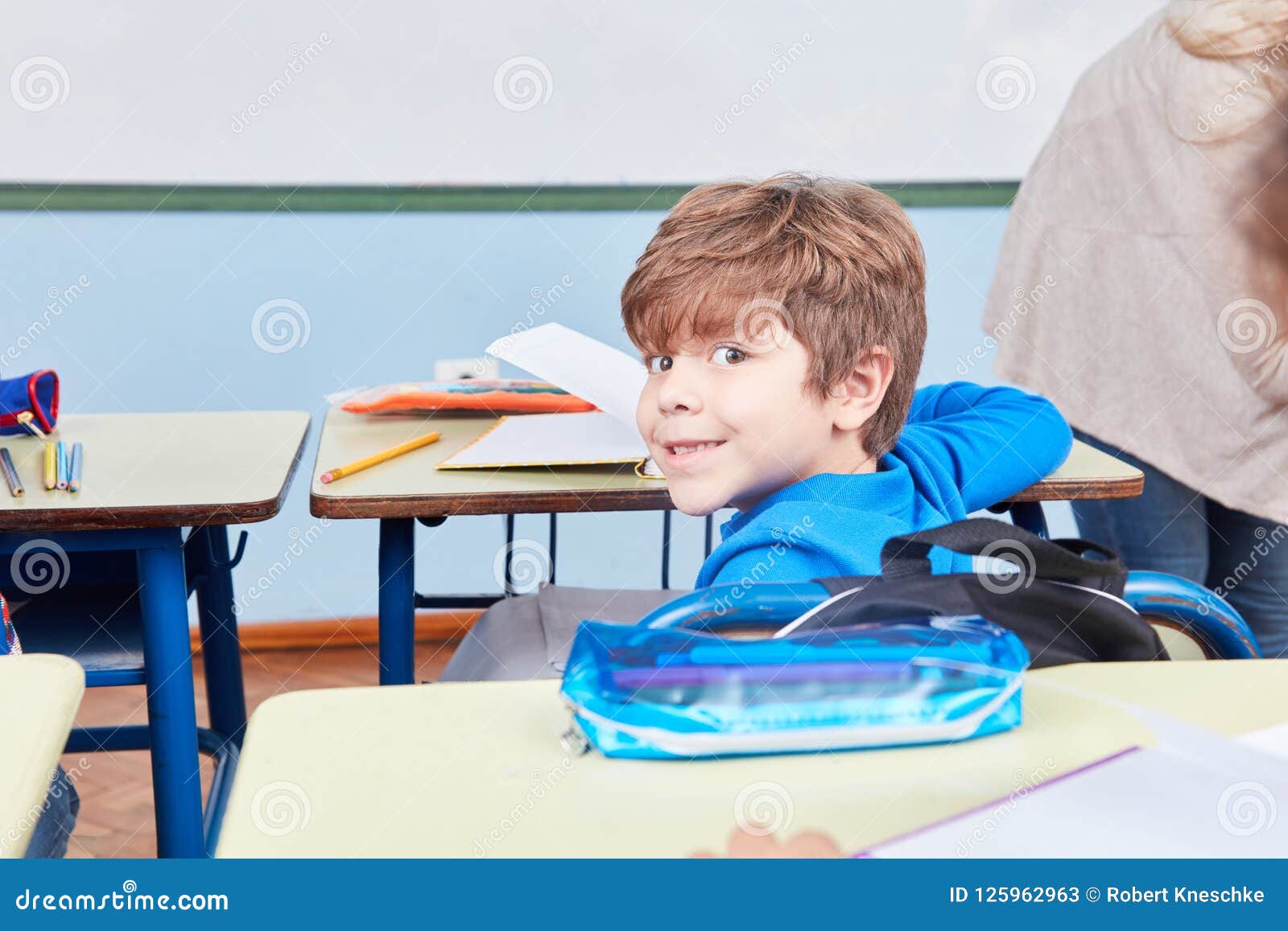 Boy As Elementary Student Smiles Mischievously Stock Image - Image of ...