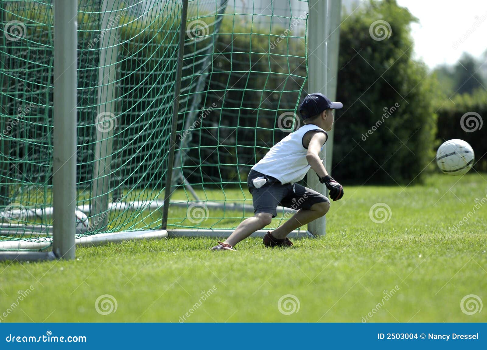 Boy As Keeper at a Soccer Game Stock Photo - Image of diversity, game ...