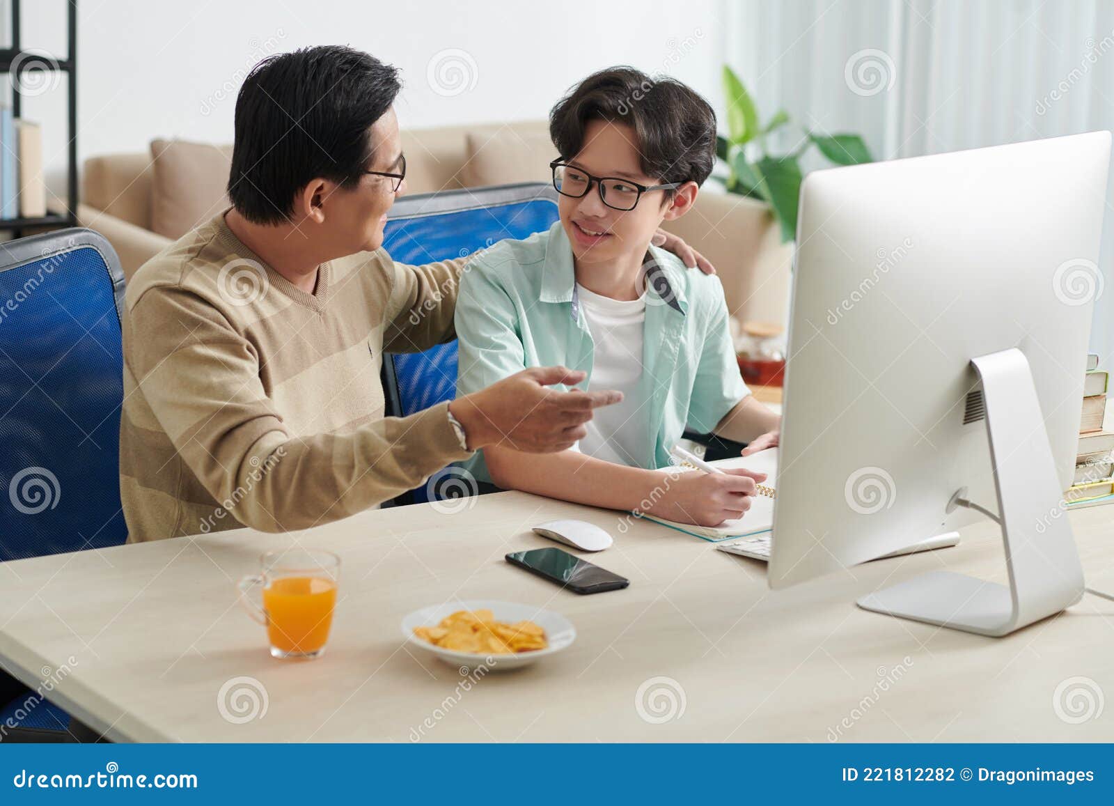 Boy Asking Father To Help with Homework Stock Photo - Image of adult ...