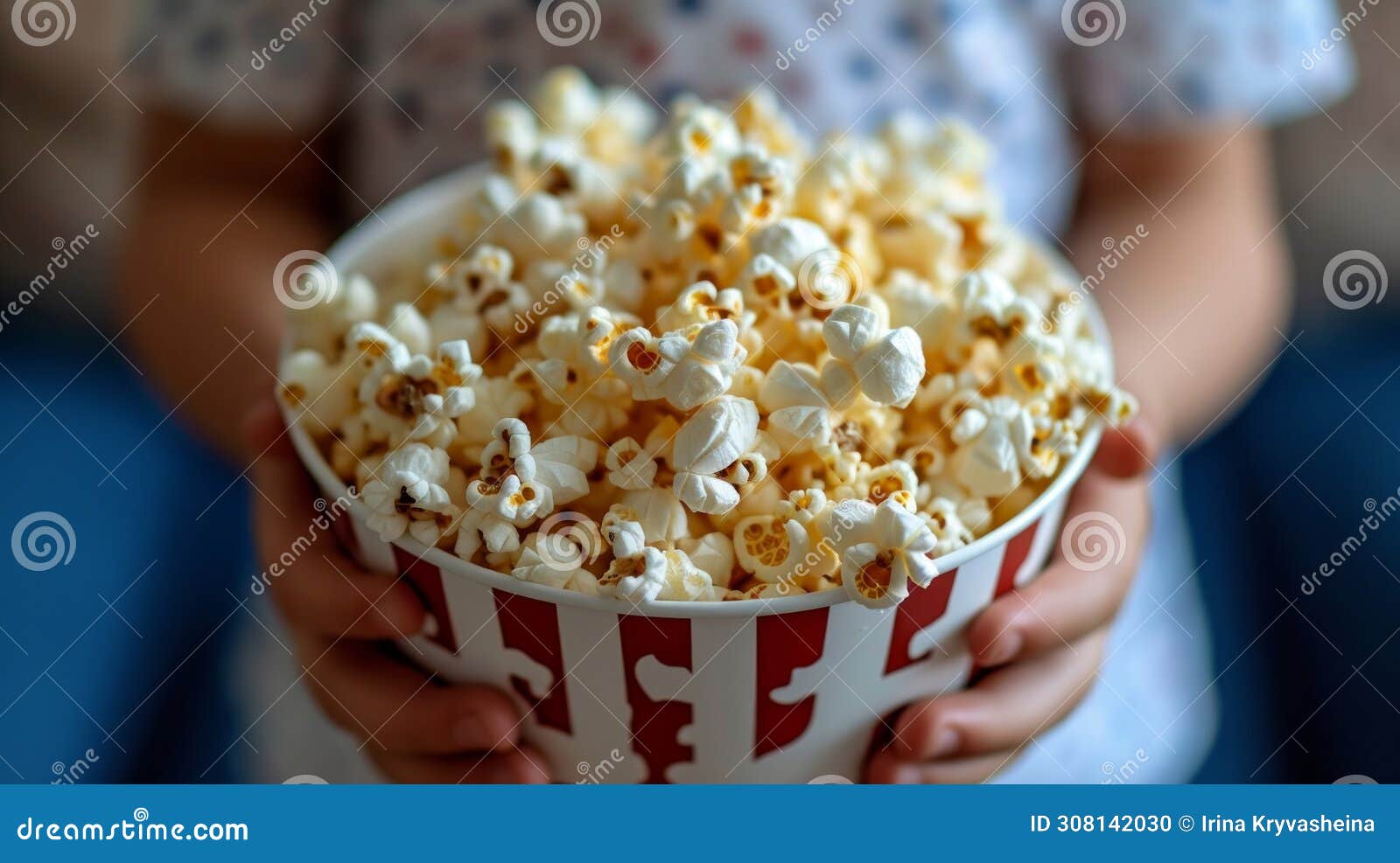 The Boy Ate a Bucket of Popcorn and it Was Torn into Small Pieces Stock ...