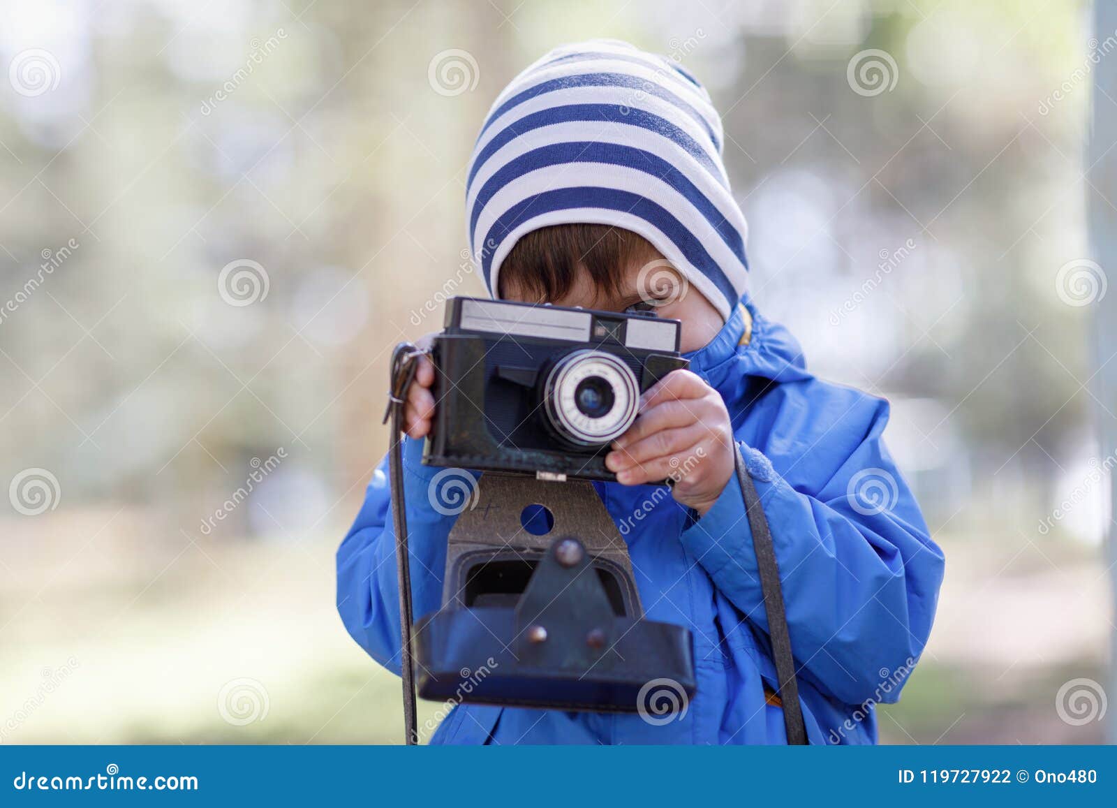 Boy with camera stock photo. Image of european, holding - 119727922