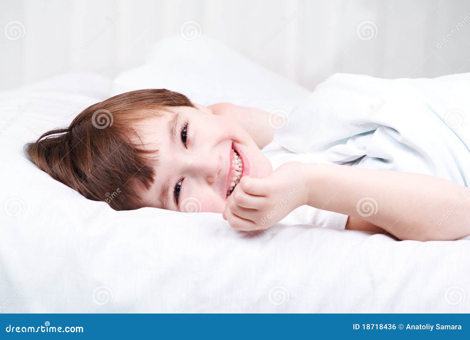 Boy awaken stock photo. Image of comfortable, happiness - 18718436