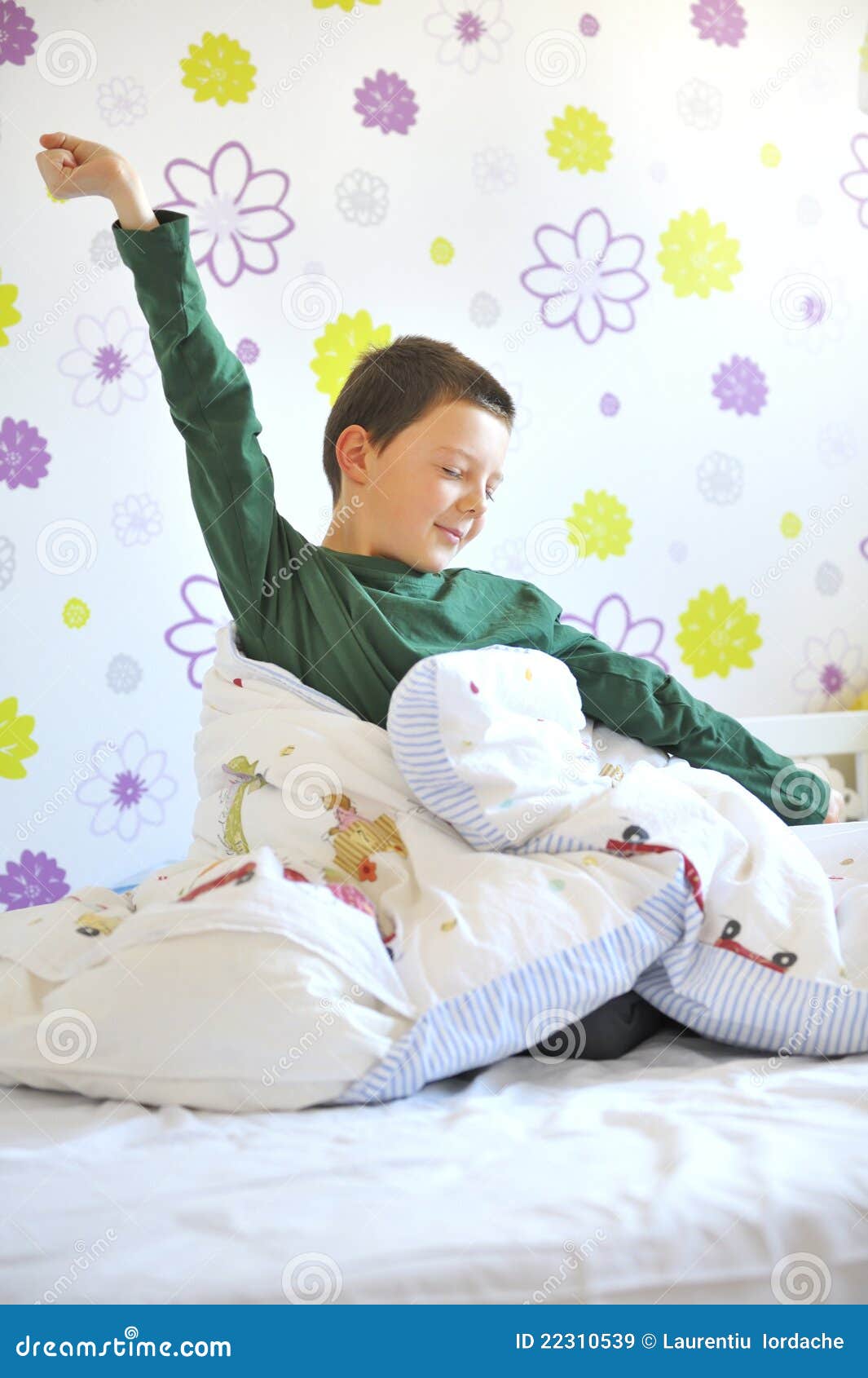 Boy Awakening in his bed stock image. Image of people - 22310539