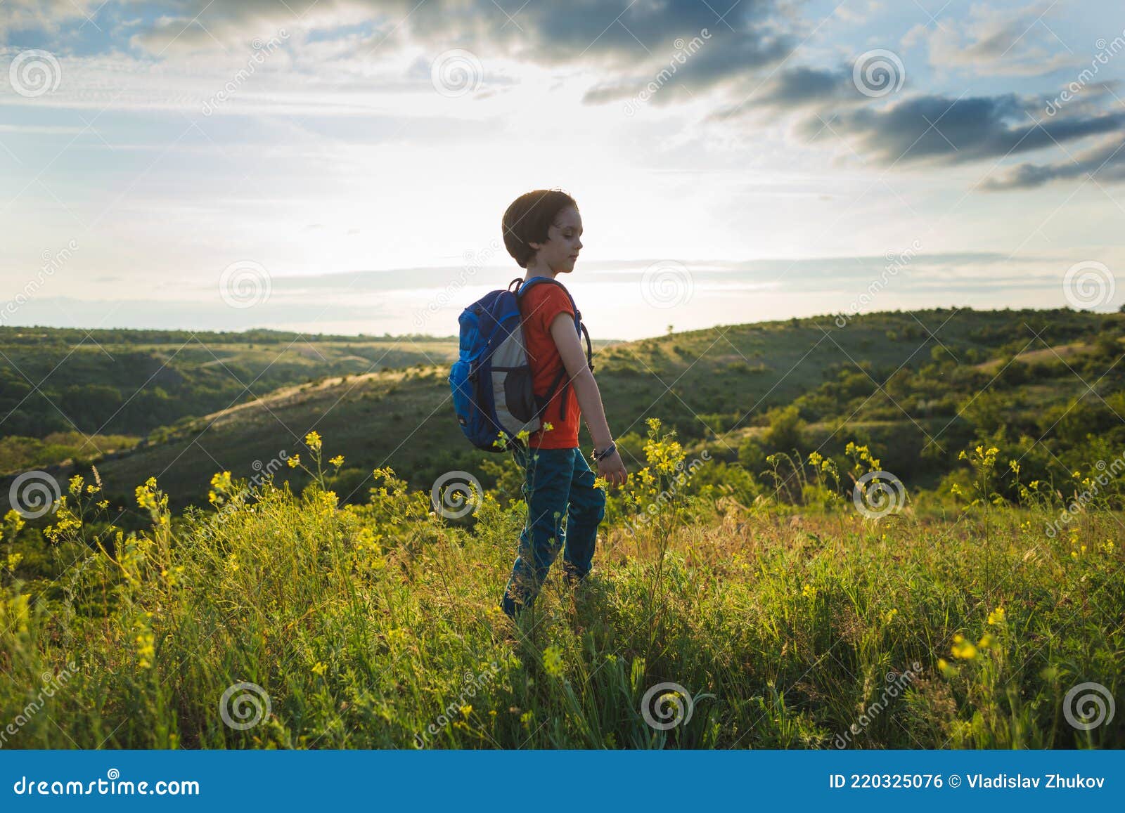 Boy with a Backpack on a Hike Stock Photo - Image of journey, leisure ...
