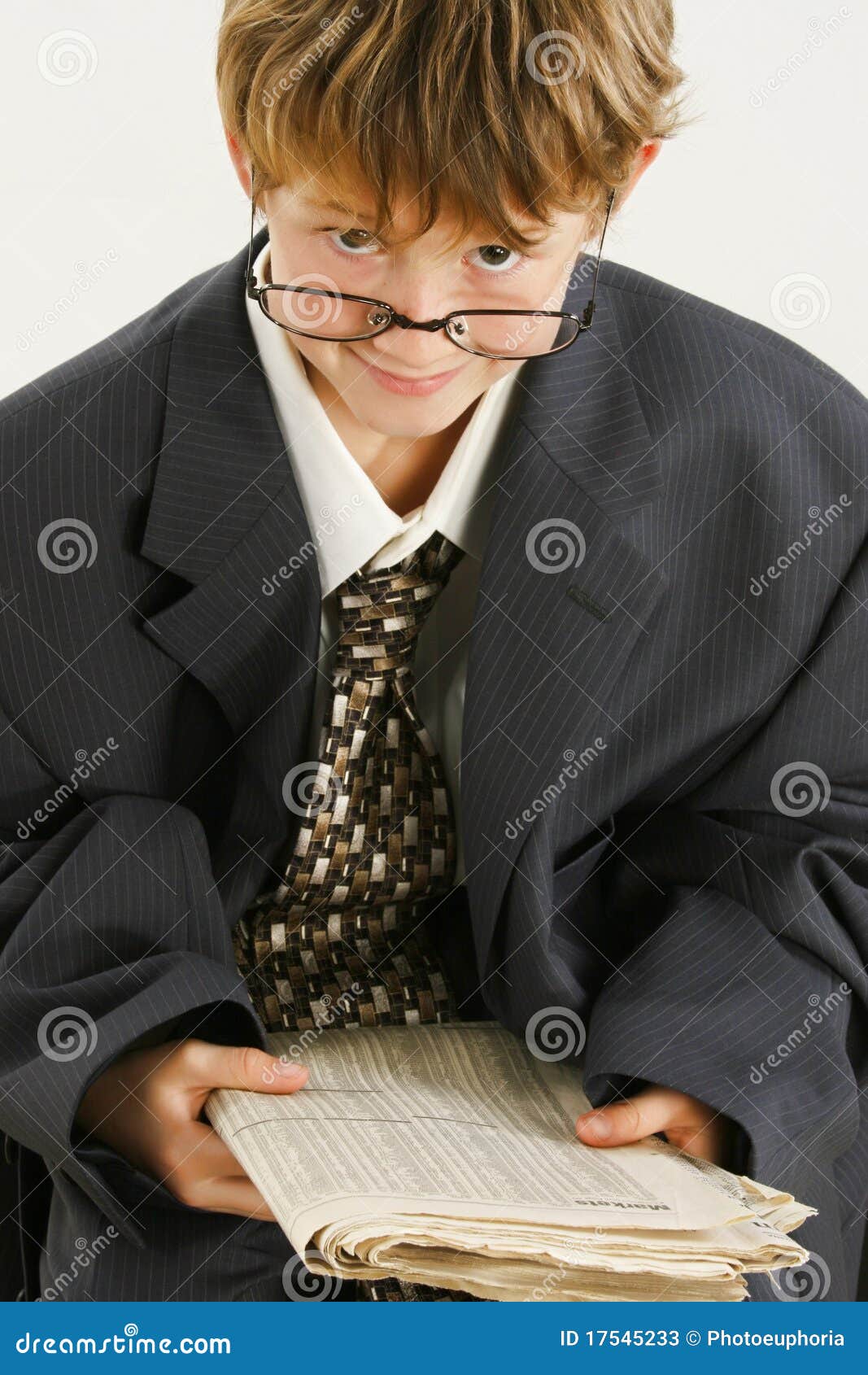 Boy in Baggy Suit Reading Newspaper Stock Image - Image of business ...