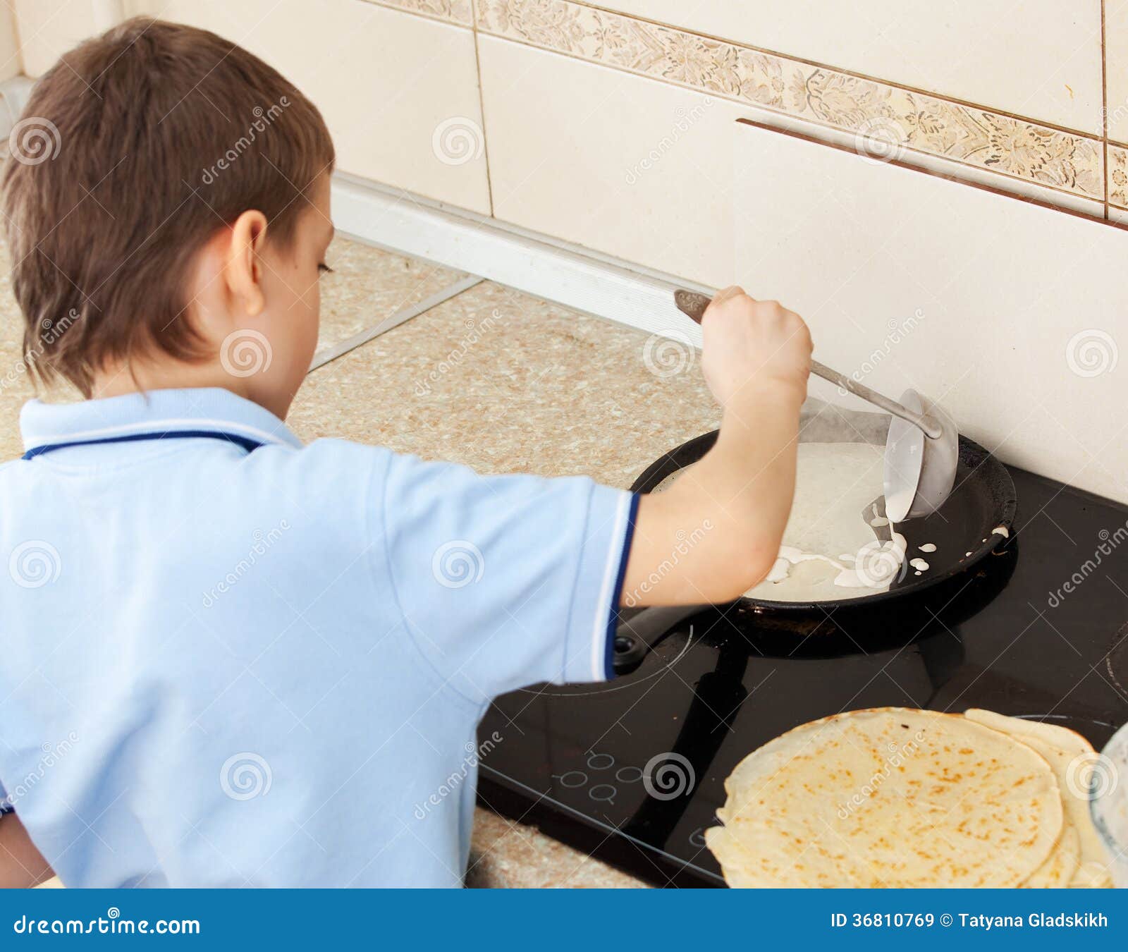 Boy bakes pancakes stock image. Image of child, crepes - 36810769