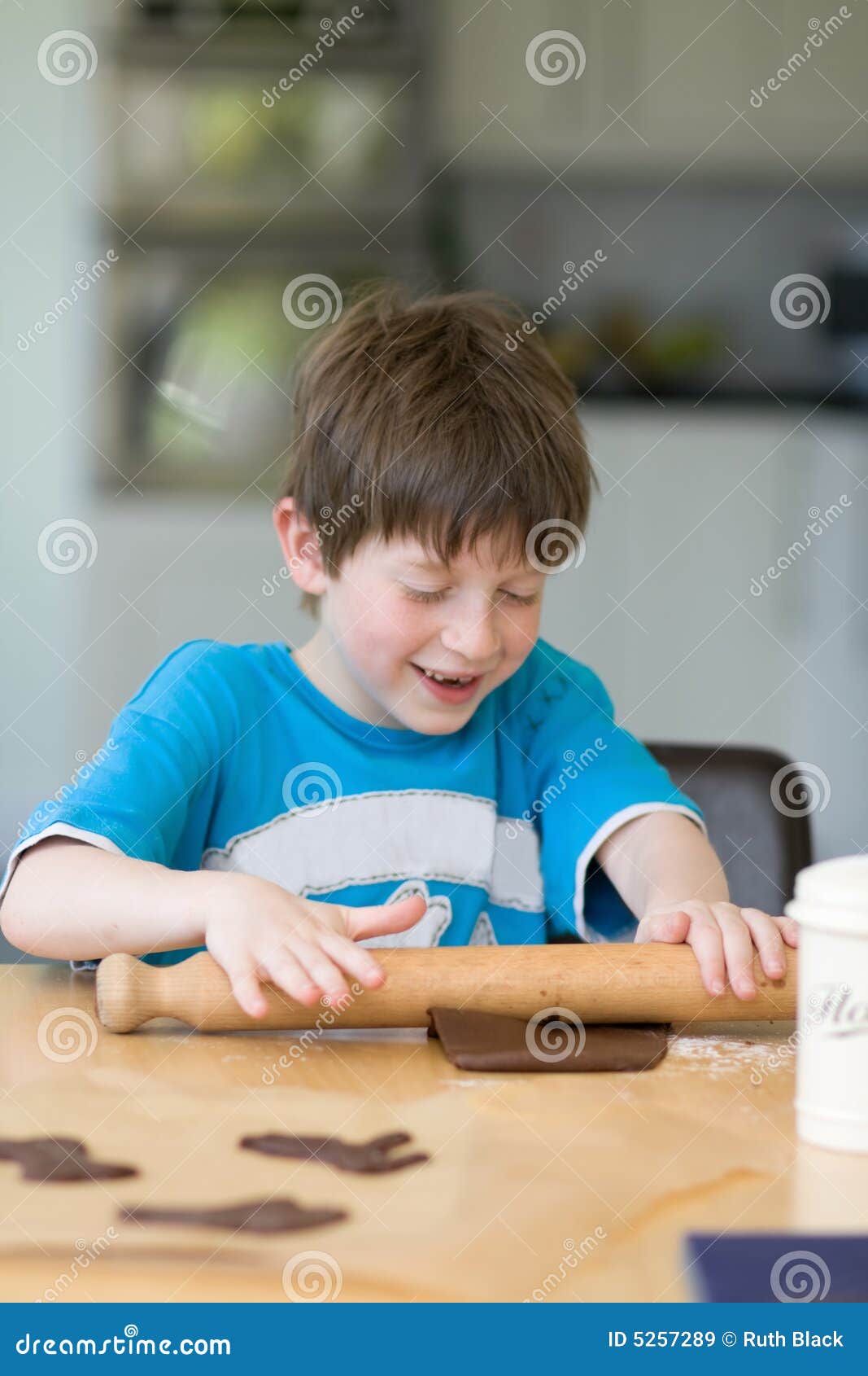Boy baking cookies stock image. Image of laughing, kitchen - 5257289