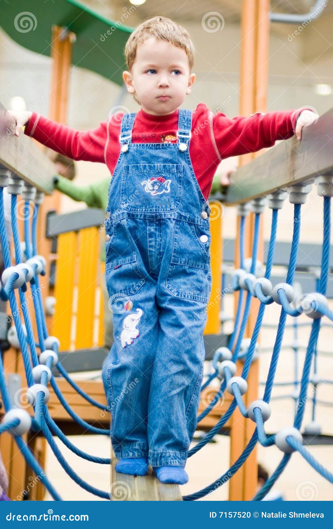 Boy on a balance beam stock photo. Image of concentrate - 7157520