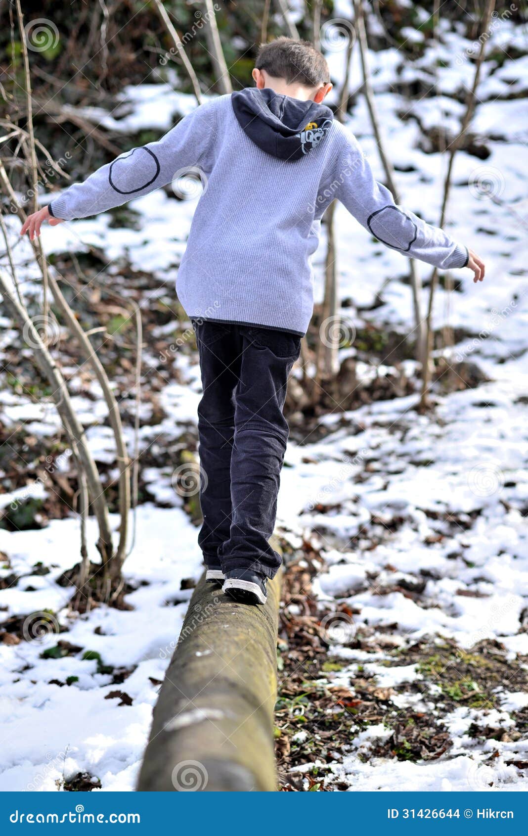 Boy Balancing on Log in the Winter Stock Photo - Image of experience ...