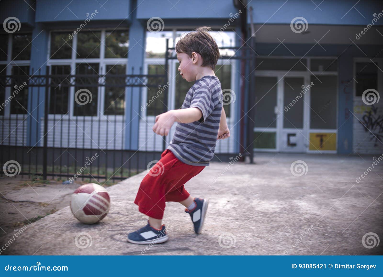 A boy with a ball stock image. Image of happy, little - 93085421
