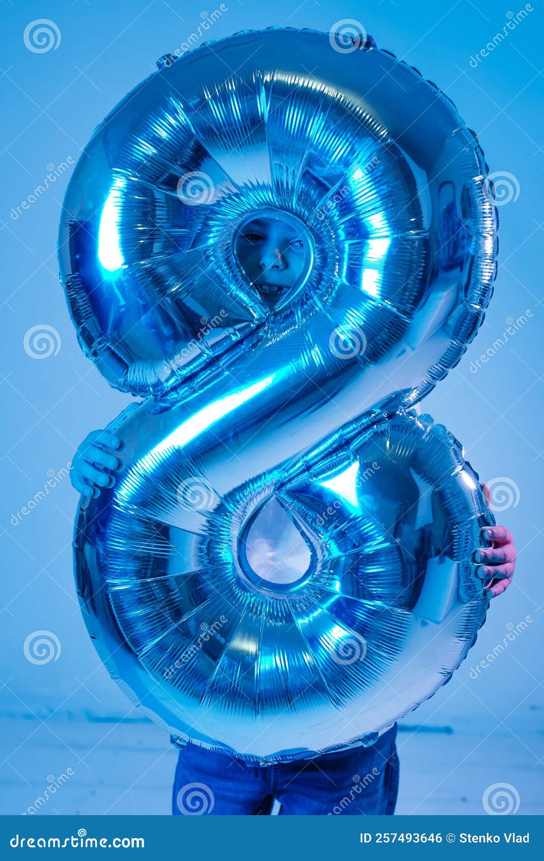 Boy with a Balloon in the Form of the Number Eight Stock Photo - Image ...