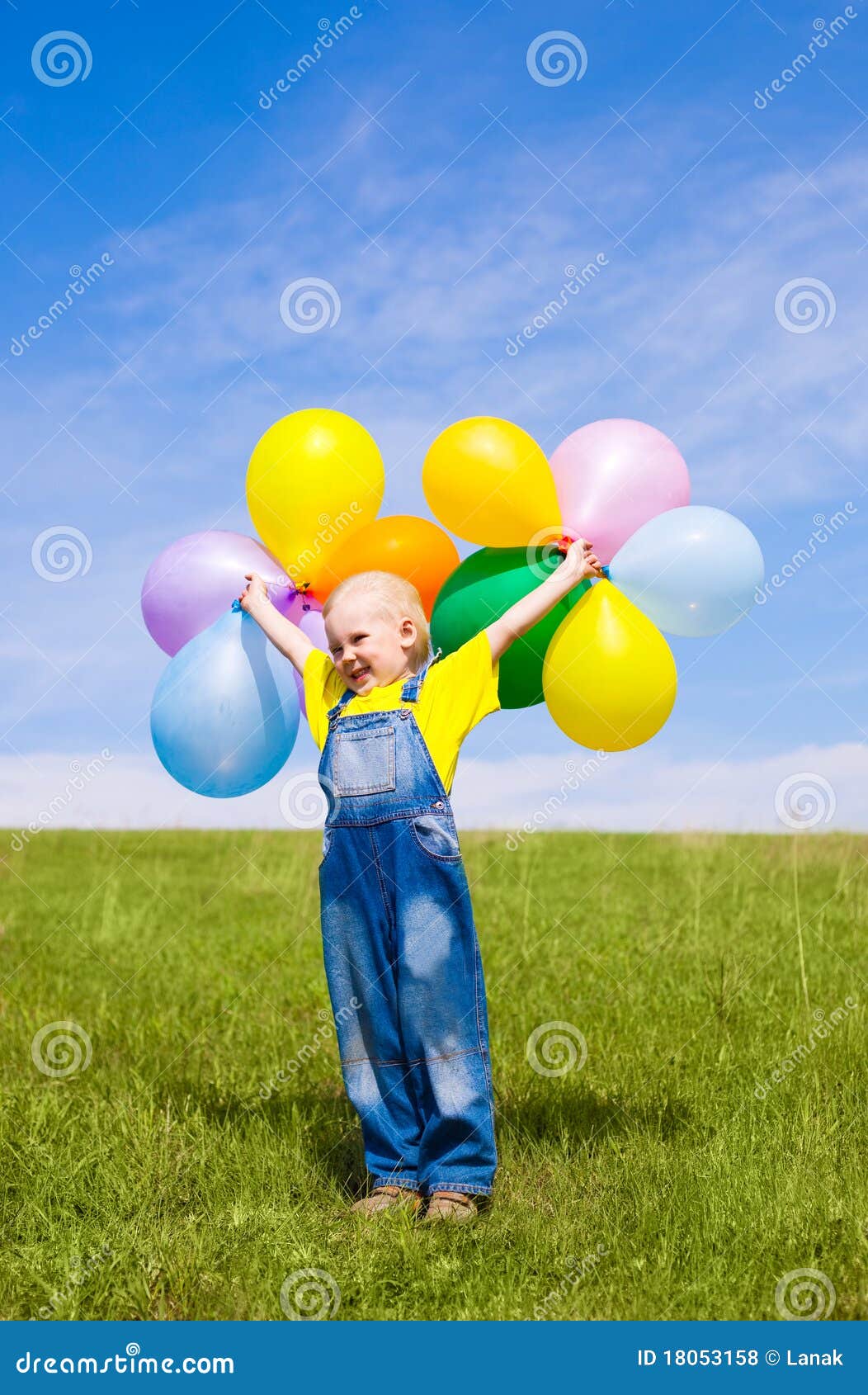 Boy with balloons stock photo. Image of casual, clouds - 18053158
