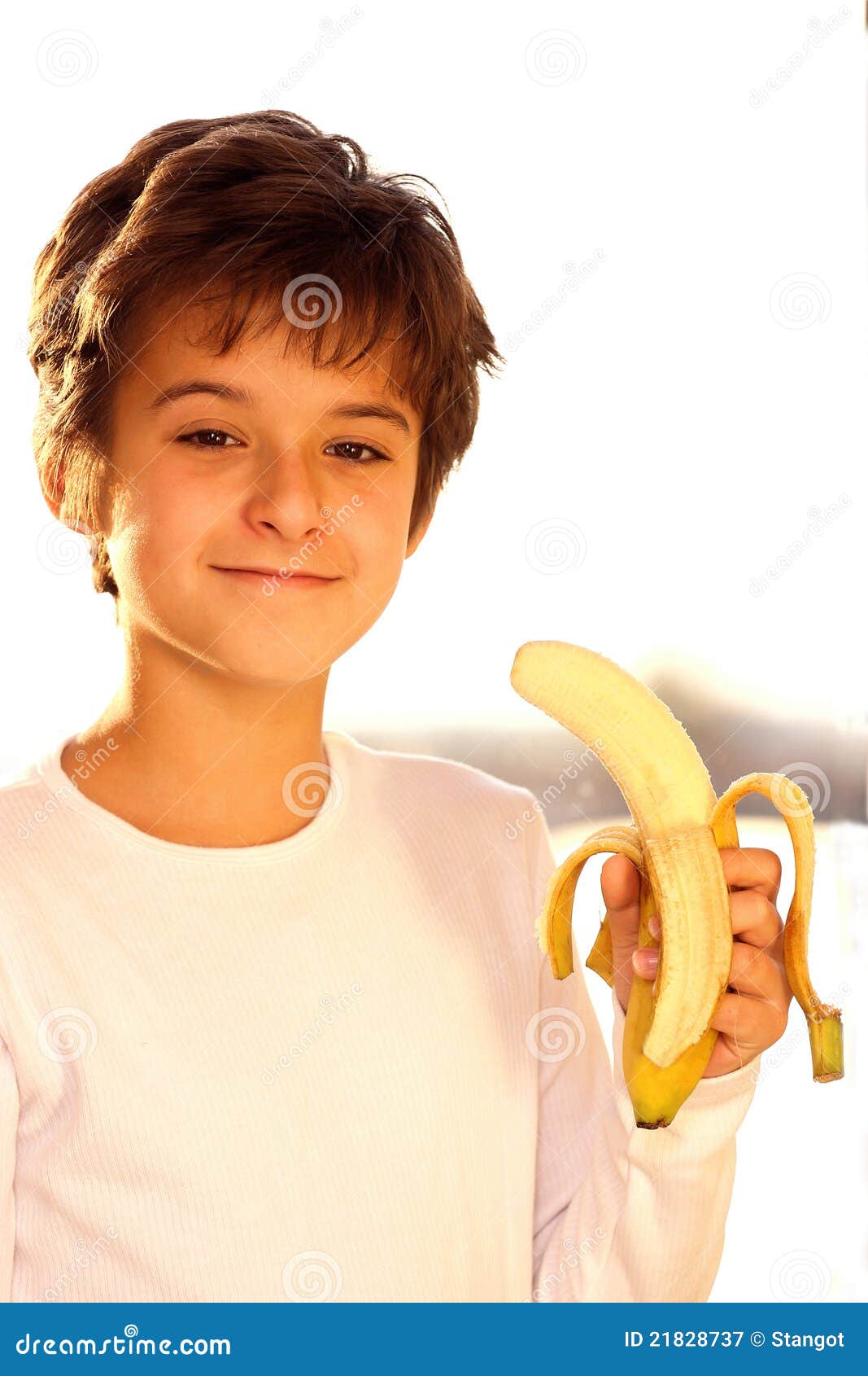 A boy with banana stock image. Image of alone, object - 21828737