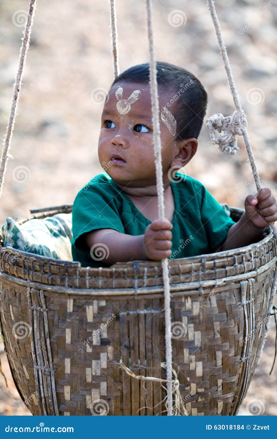 Boy in a basket, Myanmar editorial stock image. Image of culture - 63018184