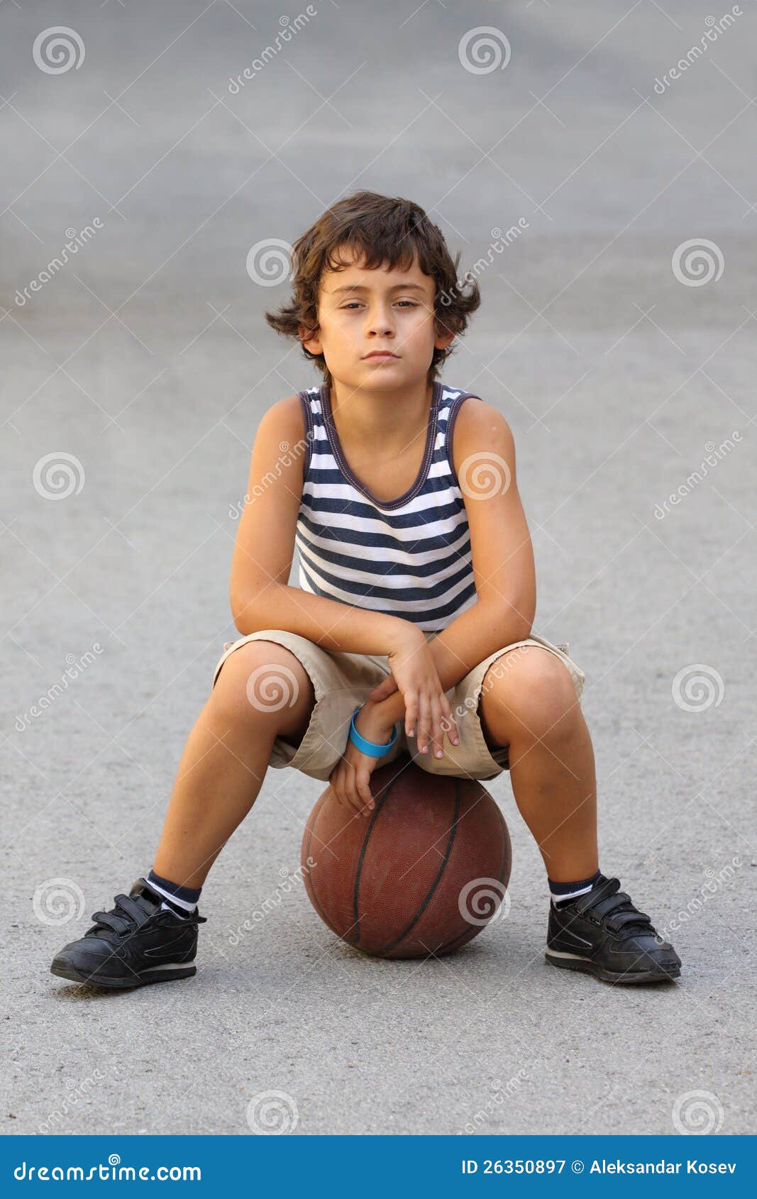 Boy with basketball ball stock image. Image of player - 26350897