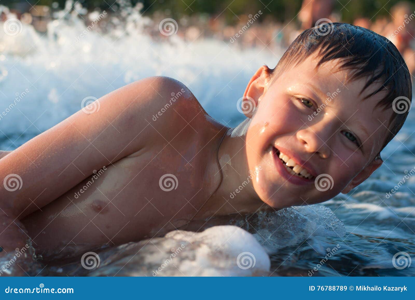 Boy bathing in the sea stock image. Image of human, playful - 76788789