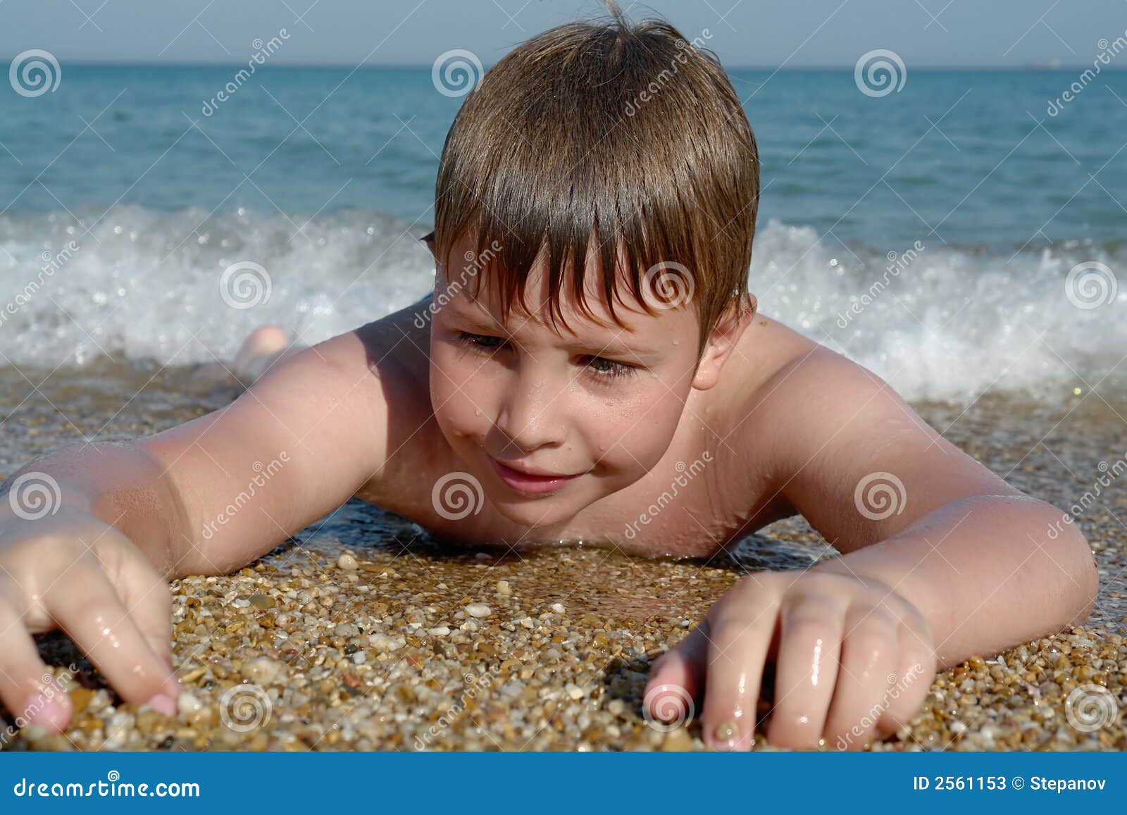 Boy at Beach stock image. Image of leisure, sand, playing - 2561153