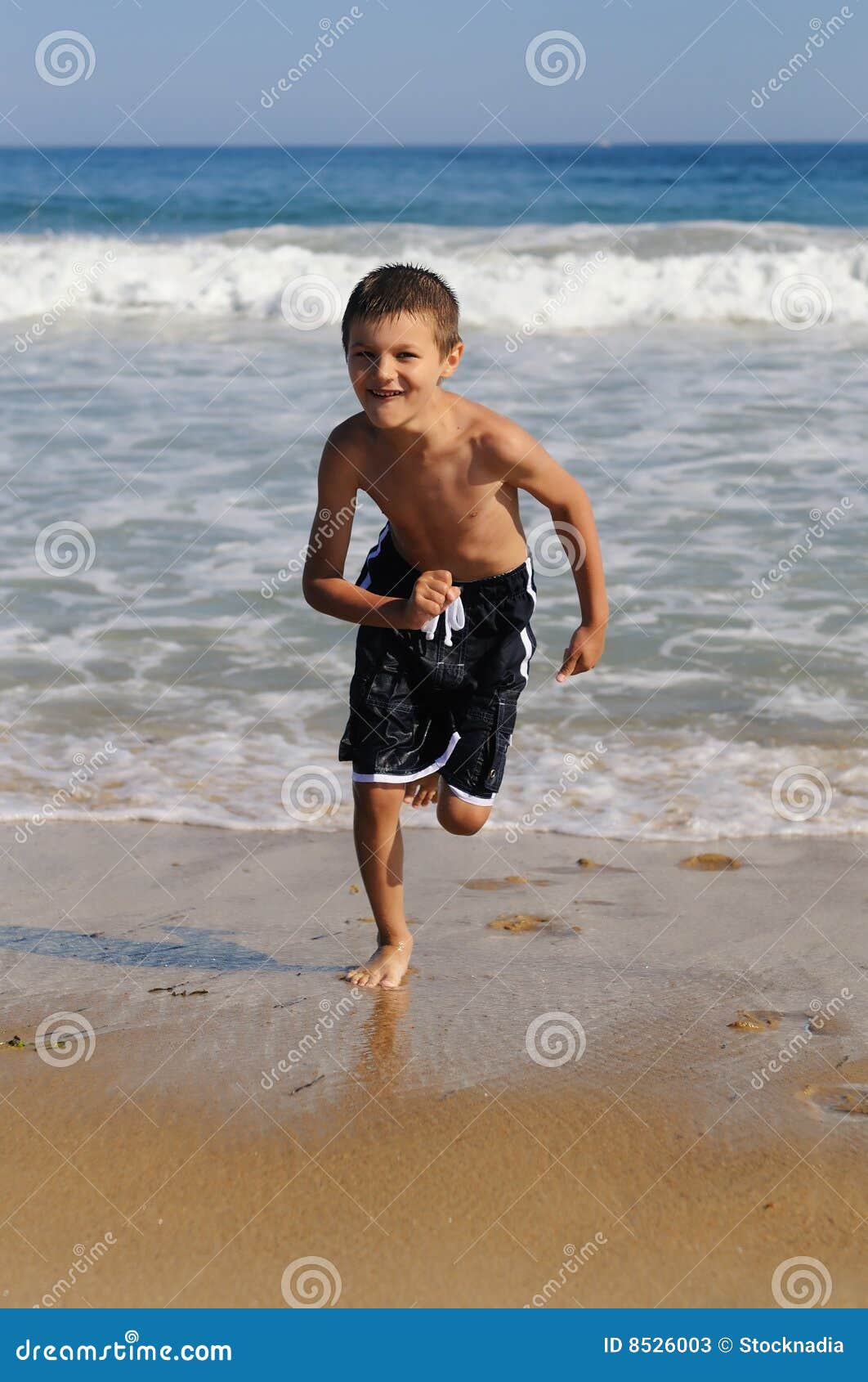 Boy on the beach stock image. Image of clear, water, person - 8526003