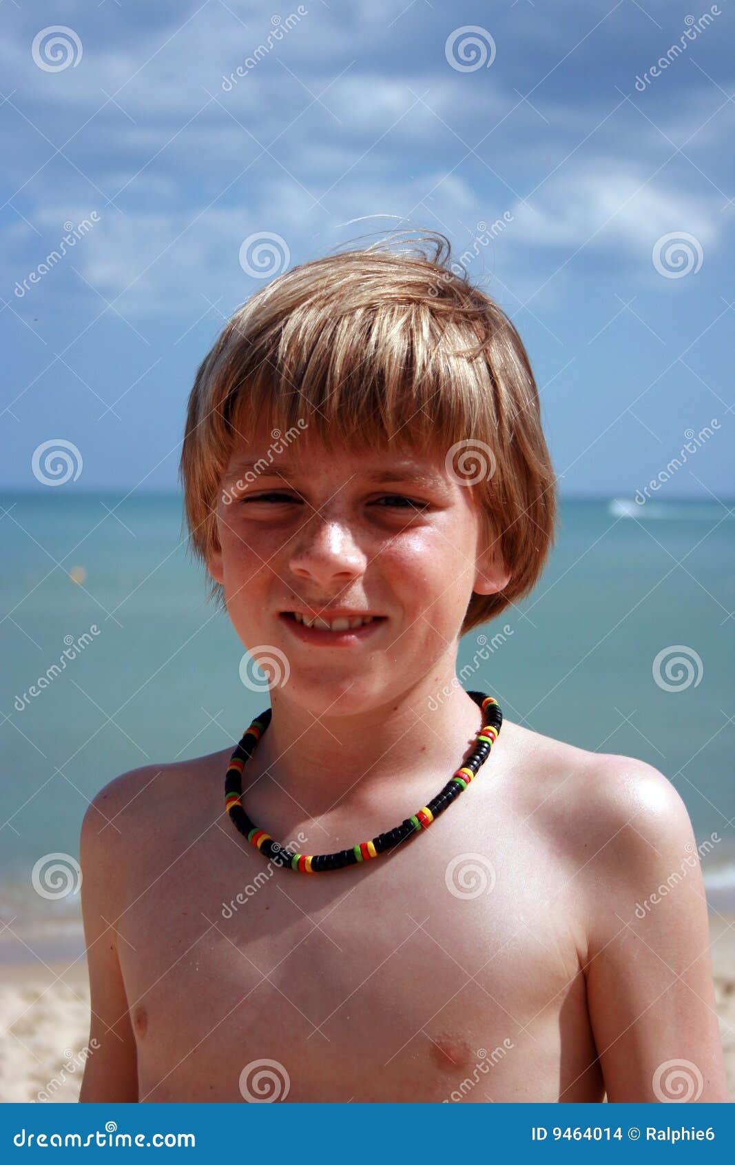 Boy on a beach stock photo. Image of nice, beach, water - 9464014