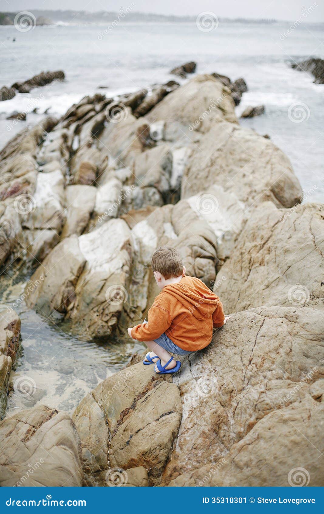 Boy at the Beach stock image. Image of playing, adventure - 35310301
