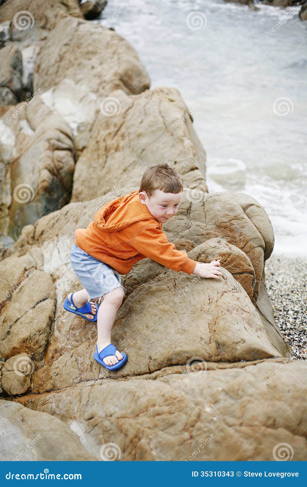 Boy at the Beach stock image. Image of youngster, play - 35310343