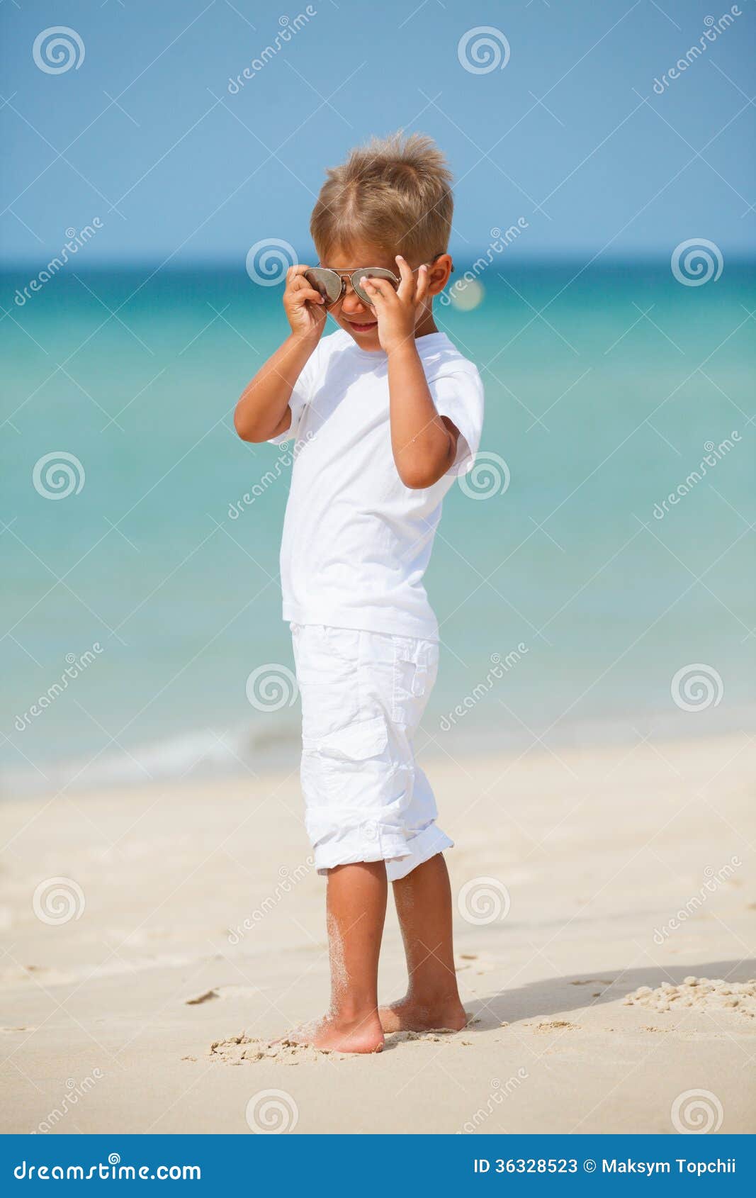 Boy on the beach stock image. Image of coast, light, cheerful - 36328523