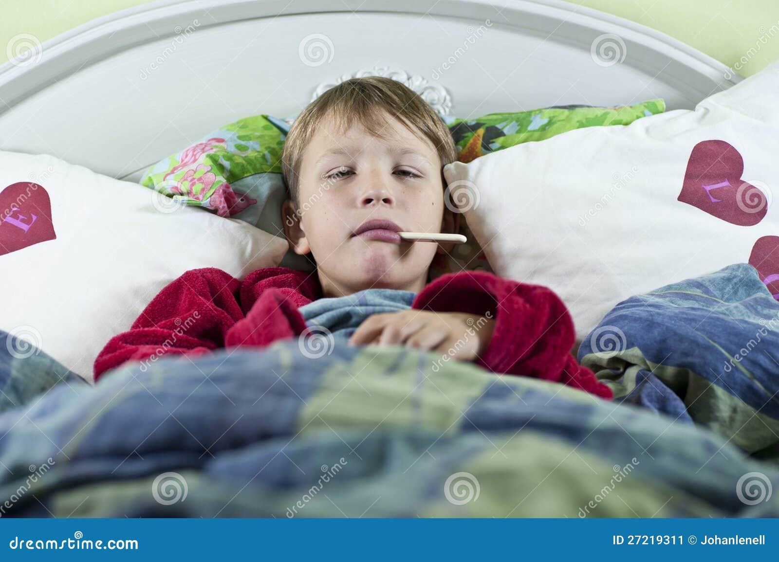 Boy in bed with the flu stock image. Image of health - 27219311