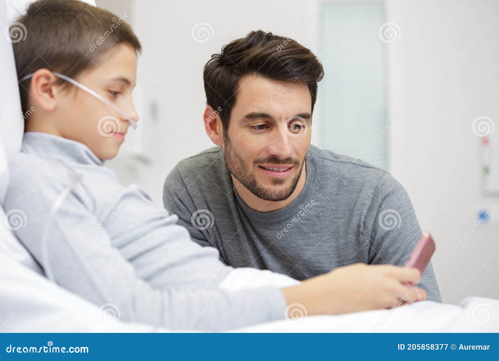 Boy in Bed at Hospital with Father Stock Image - Image of stethoscope ...