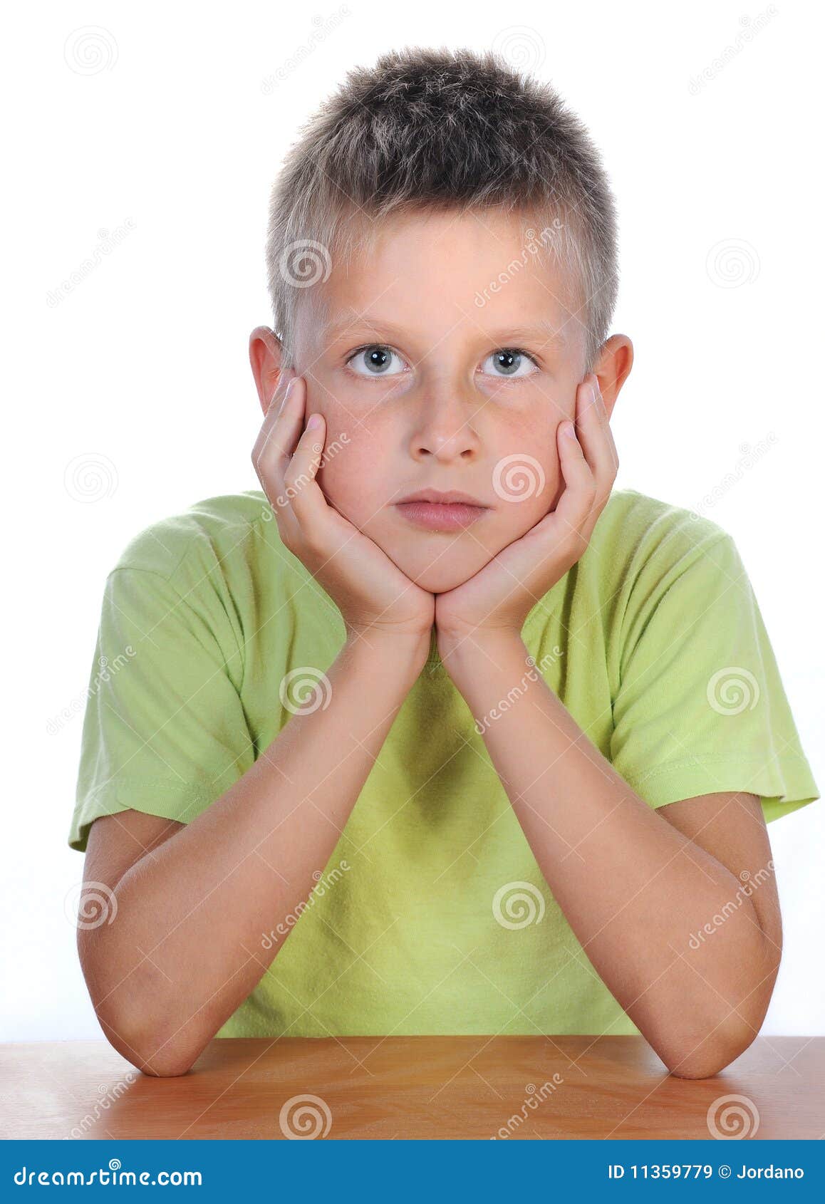 Boy behind a table stock image. Image of eyes, caucasian - 11359779