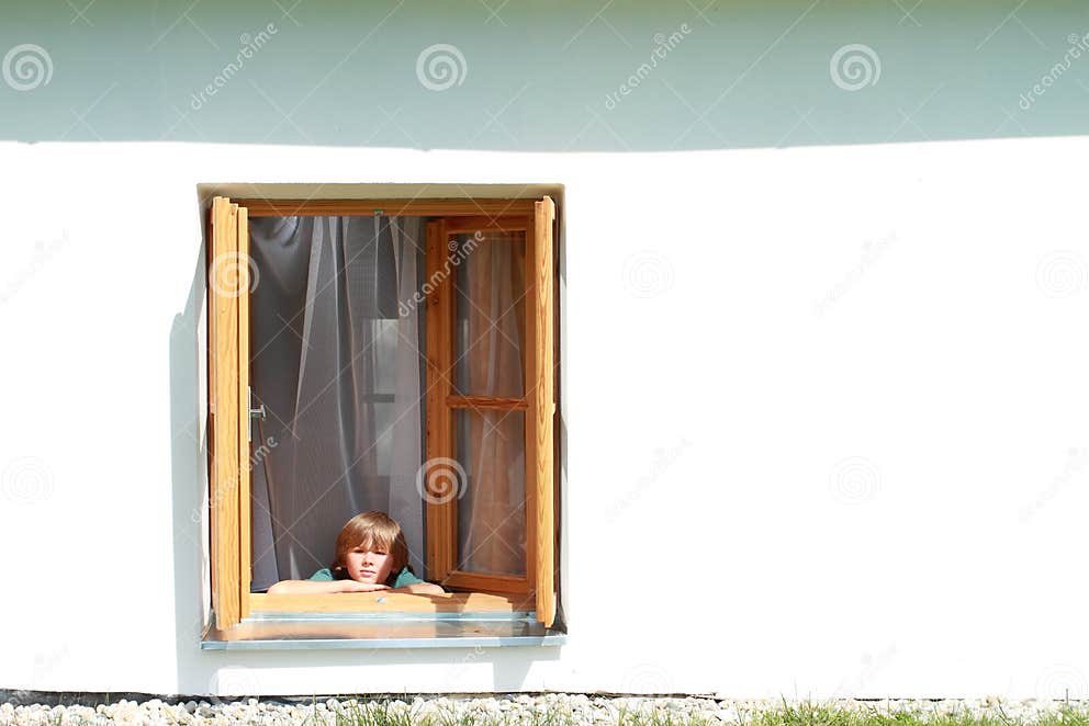 Boy behind in the window stock photo. Image of barefeet - 25493682
