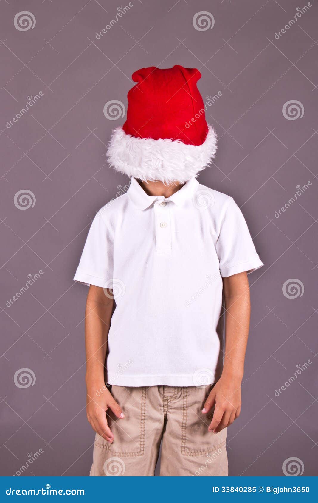 Boy Being Silly with Santa Hat during Christmas Stock Image - Image of ...