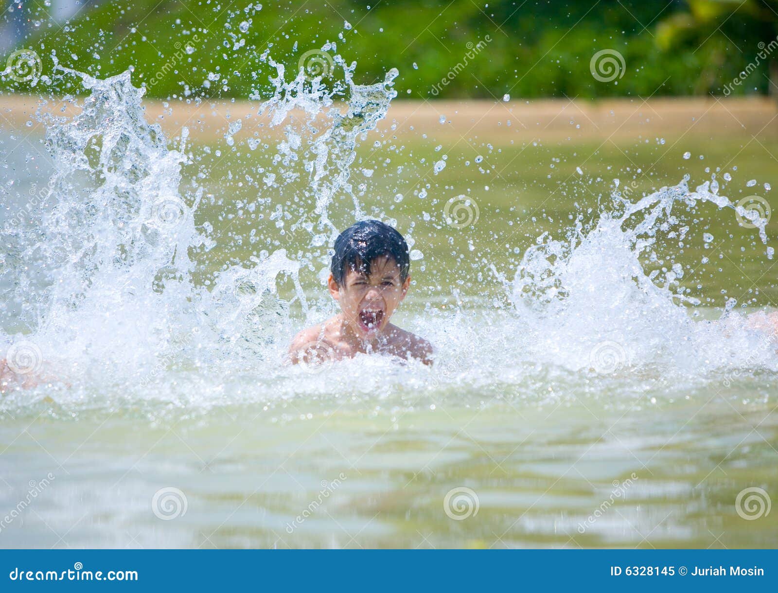 Boy Being Splashed in the Water Park Stock Image - Image of girl ...