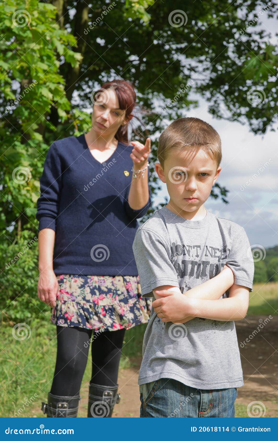 Boy Being Told Off by His Mum Stock Photo - Image of mother, frowning ...