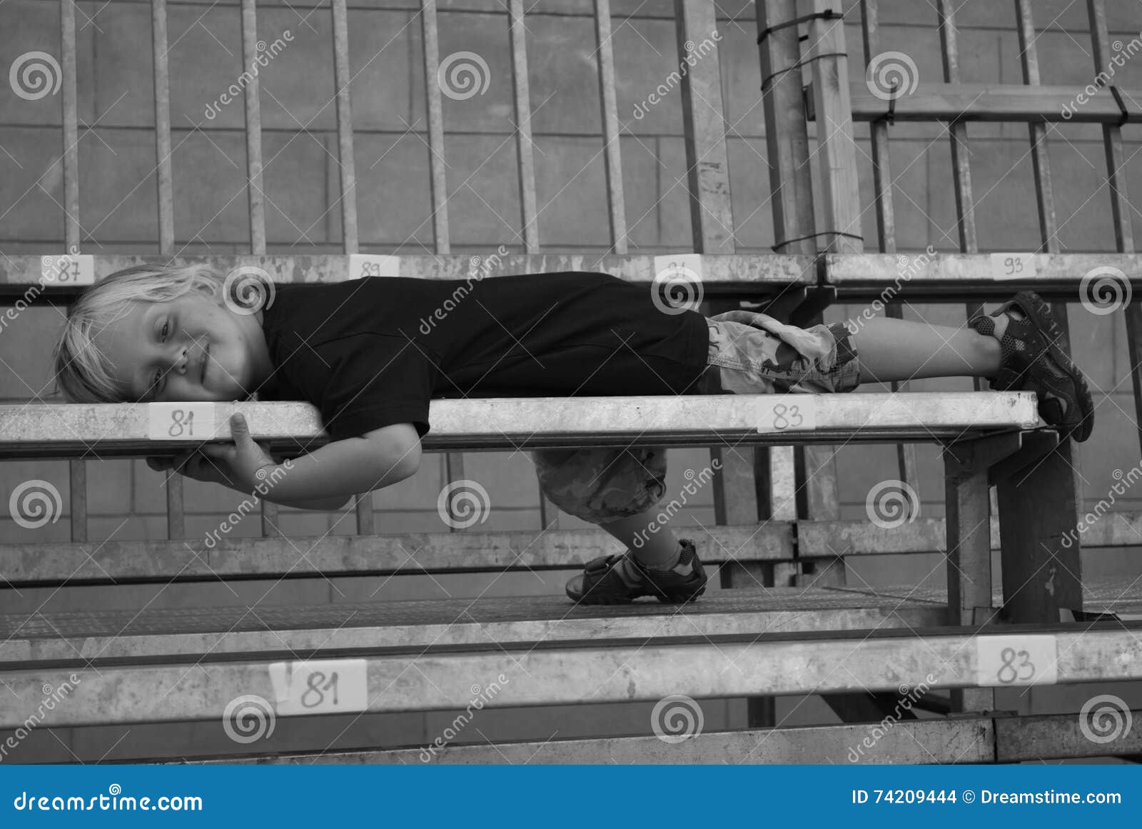 Boy on bench stock photo. Image of chris, outdoor, black - 74209444