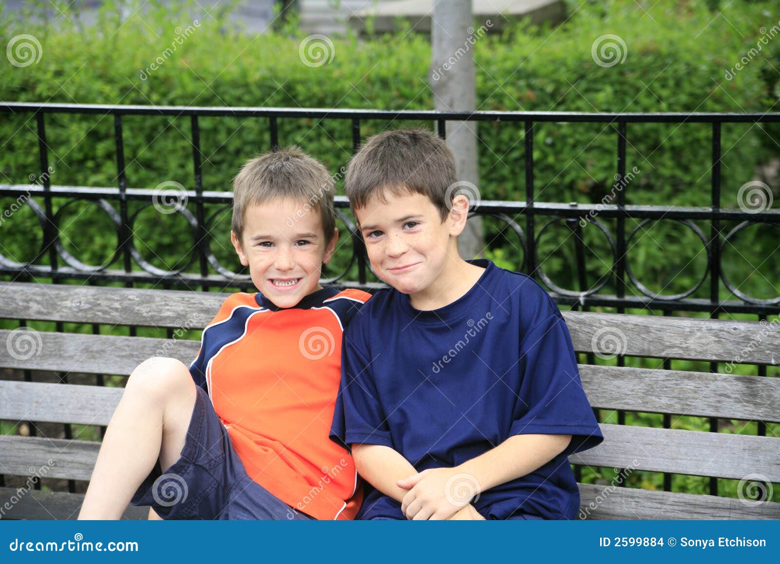 Boy on a Bench in the Park stock photo. Image of love - 2599884
