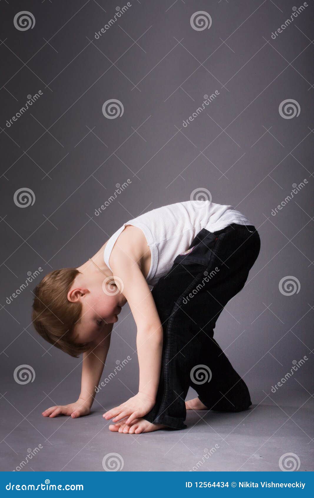 Boy bent double stock photo. Image of copyspace, grimace - 12564434