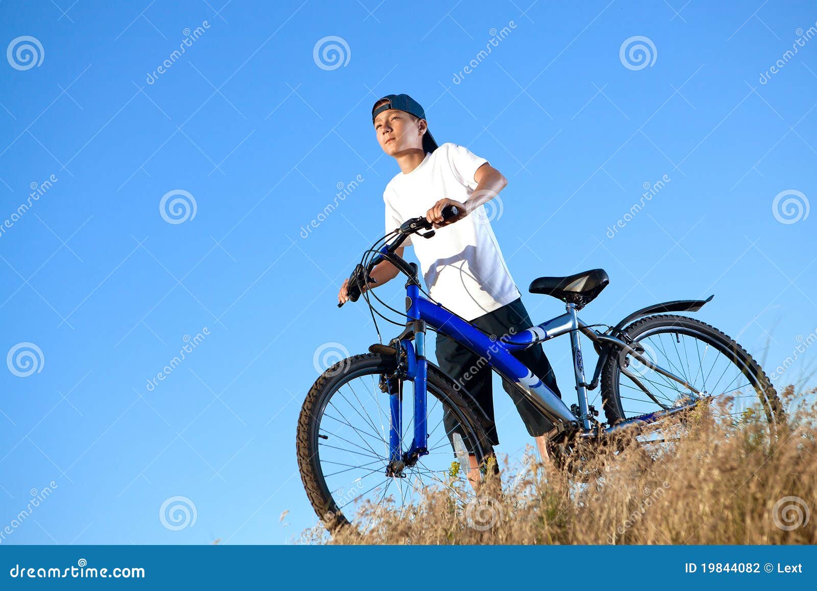 The boy with a bicycle stock photo. Image of child, bicycle - 19844082