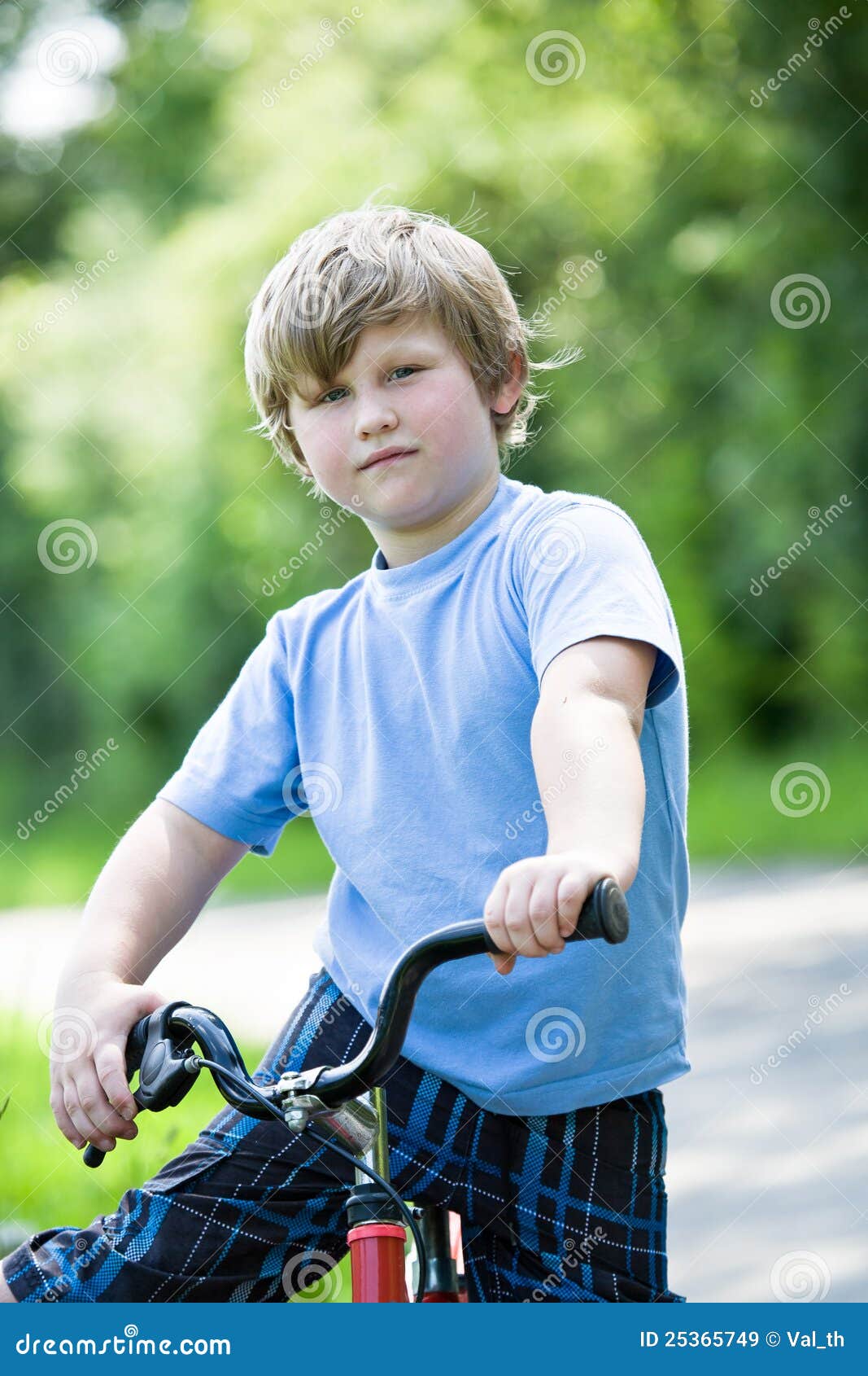 Boy with a bicycle stock image. Image of green, happiness - 25365749
