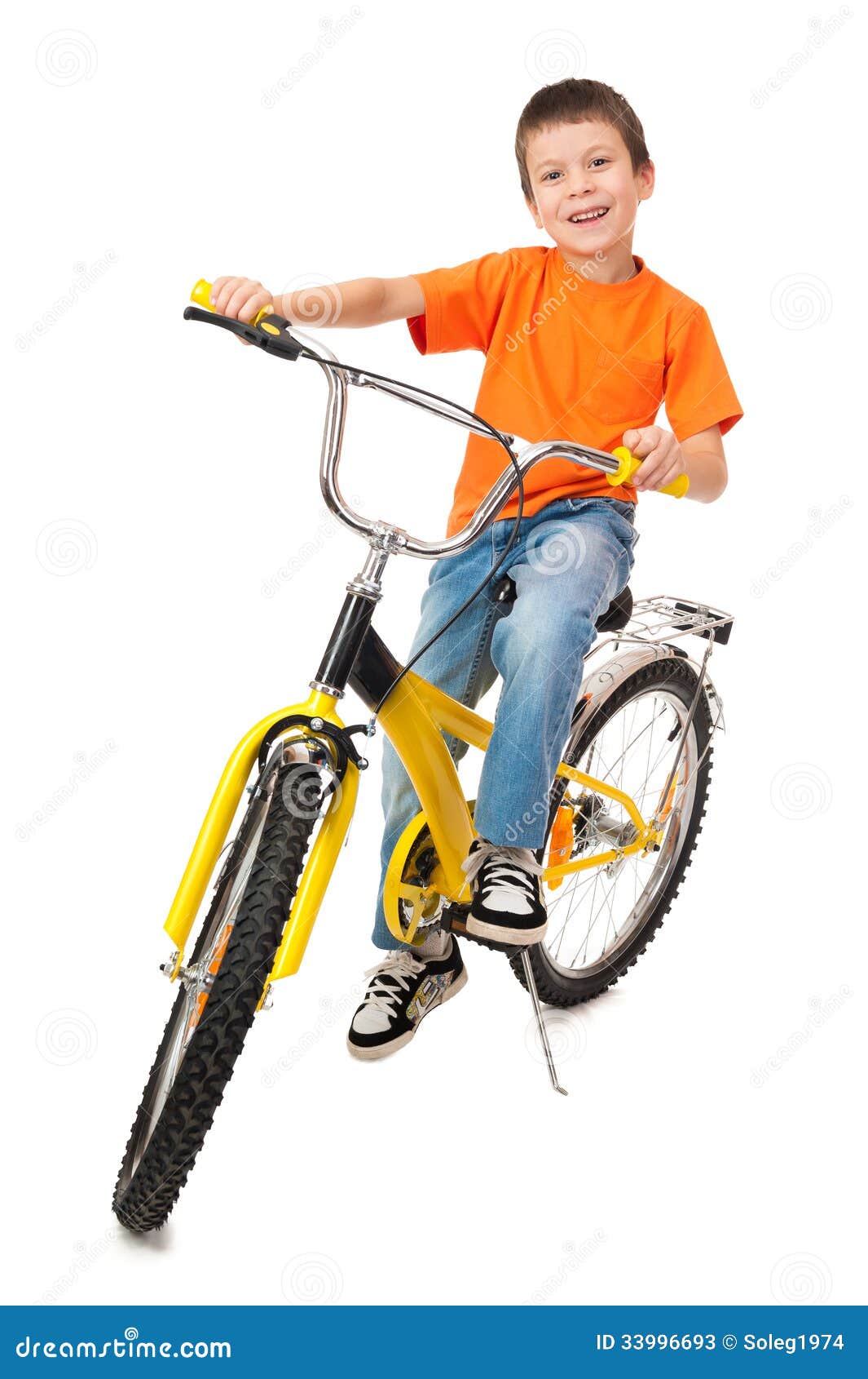 Boy on bicycle stock image. Image of biking, jeans, play - 33996693