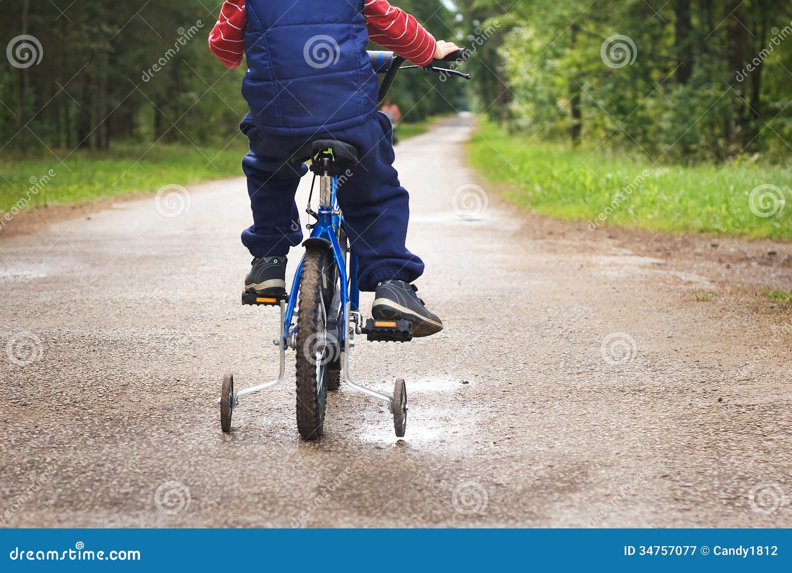 A boy on a bicycle stock image. Image of asphalt, drive - 34757077