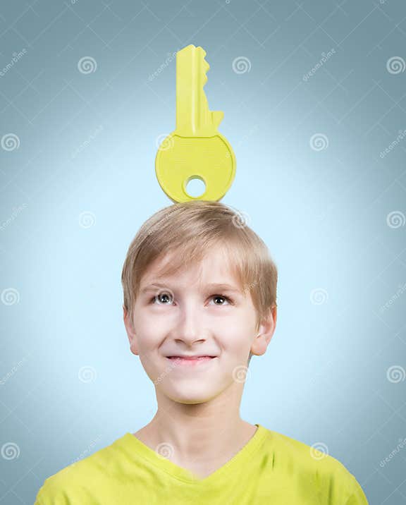 Boy with a big key stock photo. Image of access, answer - 49130202