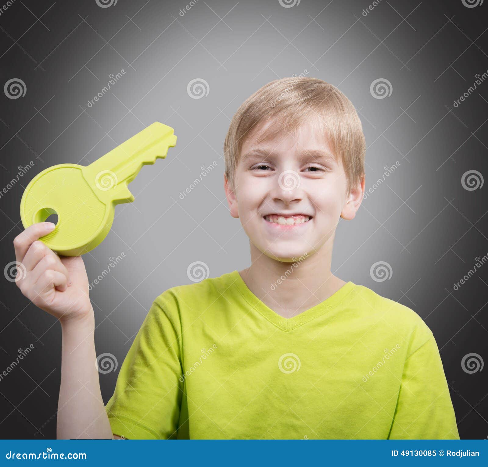 Boy with a big key stock image. Image of childhood, happy - 49130085