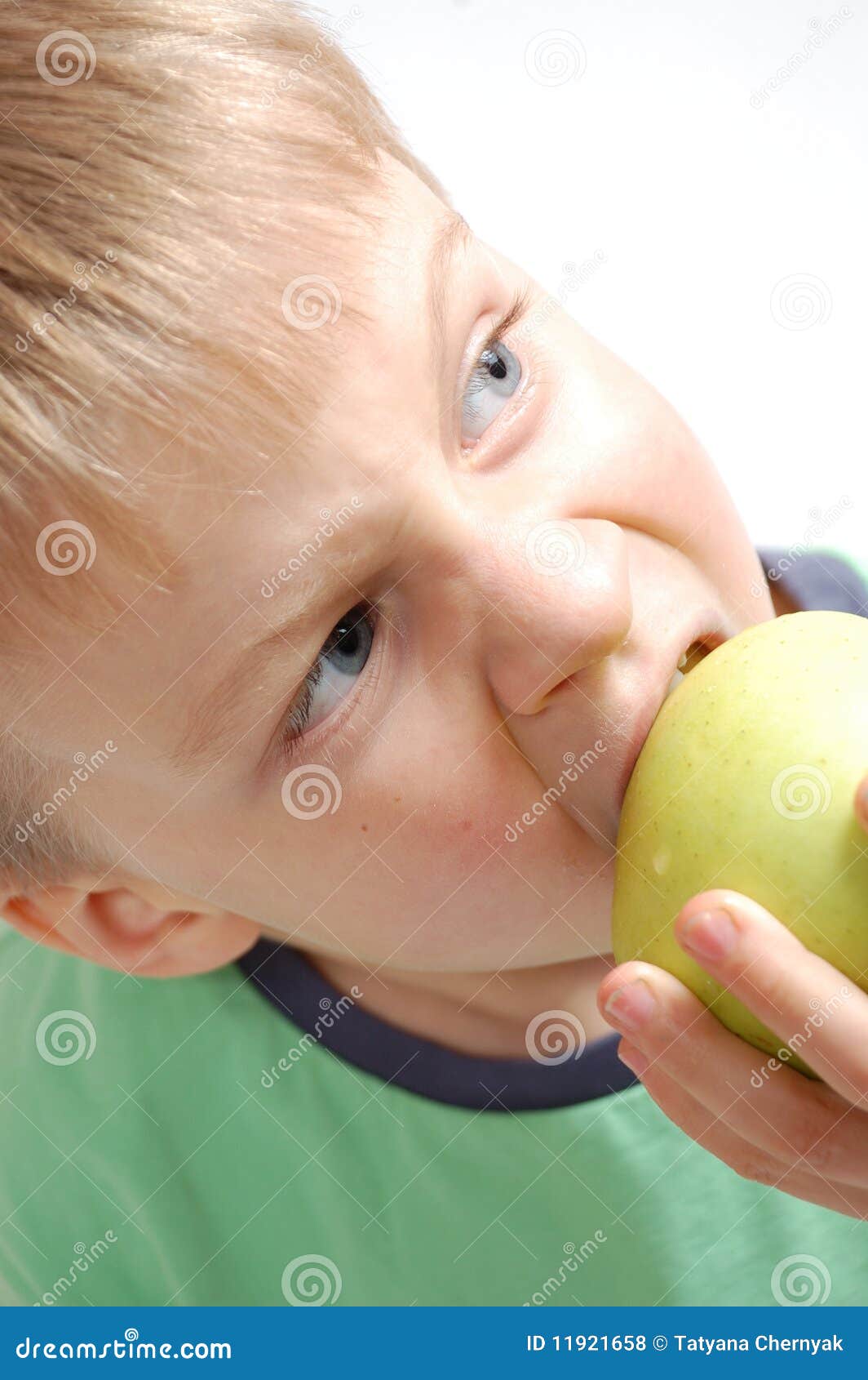 Boy biting an apple stock photo. Image of apple, eating - 11921658