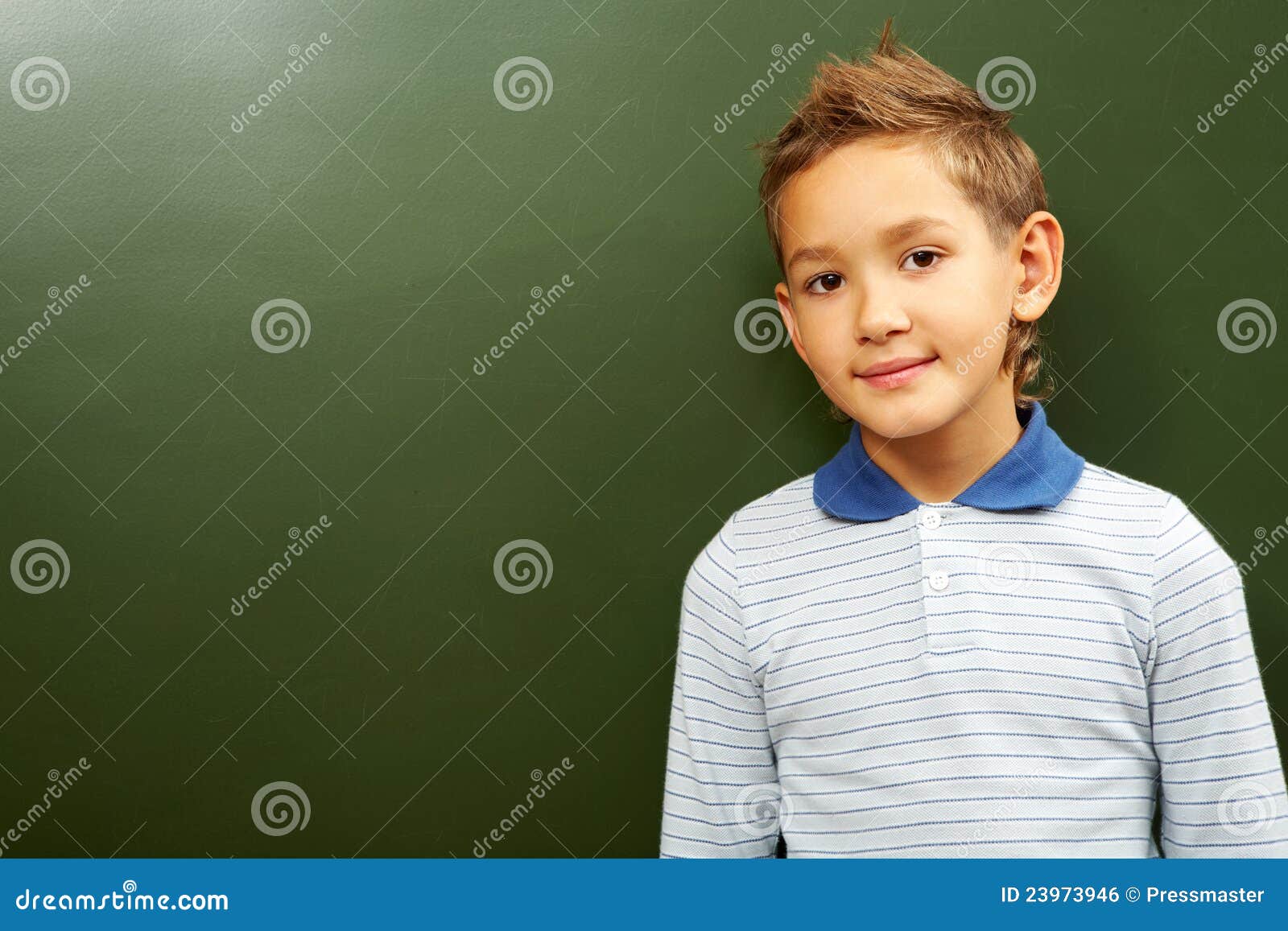 Boy at blackboard stock photo. Image of looking, diligent - 23973946