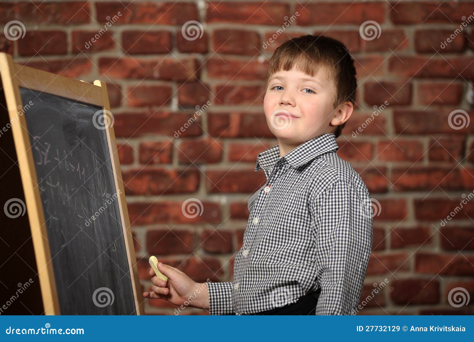 Boy at the blackboard stock image. Image of schoolboy - 27732129