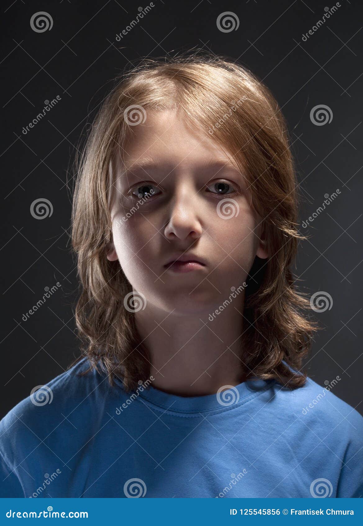 Boy with Blond Hair in Blue Top Stock Photo - Image of person ...